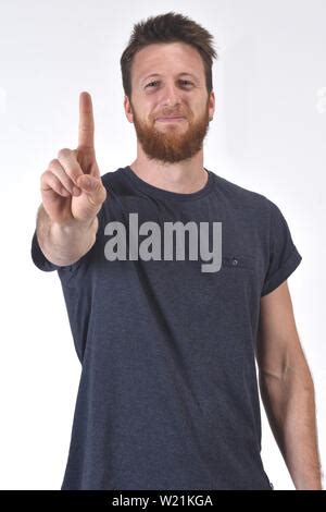 Man With Finger In The Shape Of Number One Stock Photo Alamy