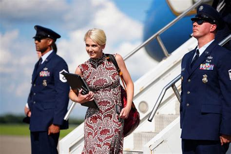 Trumps Aide Natalie Harp Spotted Clutching 4 Phones As Bizarre Duties