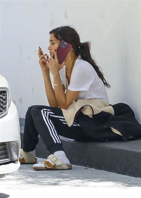 Sofia Boutella Casually Enjoys A Cigarette While Waiting For Her Car In