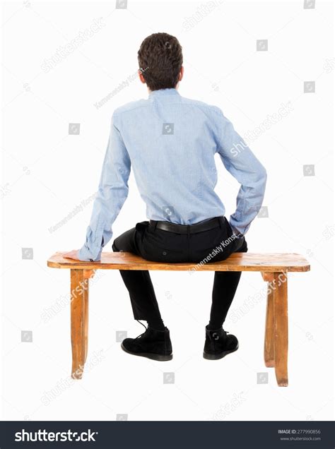 People Sitting Down On A Bench