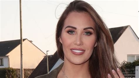 Chloe Goodman Shows Off Her Figure In A Plunging Brown Minidress As She Heads For Lunch In Essex