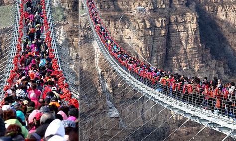 Tourists Swarm Onto The Worlds Longest Glass Bridge In China Daily Mail Online