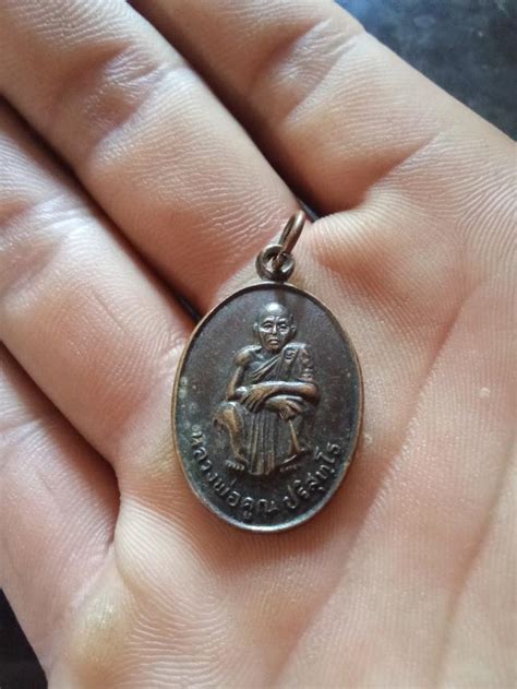 เหรียญหลวงพ่อคูณปริสุทโธรุ่นเสาร์5คูณทวีเหลืกินเหลือใช้เนื้อทองแดง Ennxo