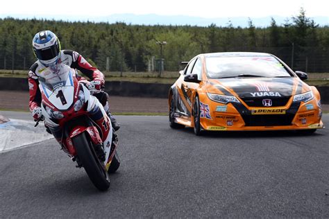 Dunlop And Honda Pit Isle Of Man Tt Legend Against Double British