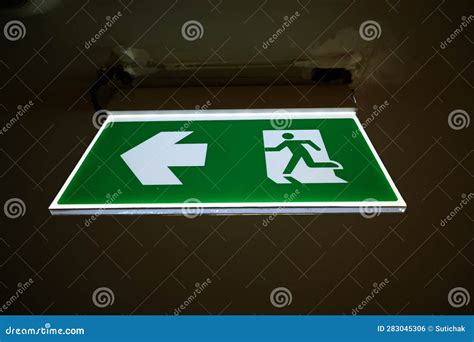 Exit Symbol For Warning People Green Light Stock Photo Image Of Emergency Hanging