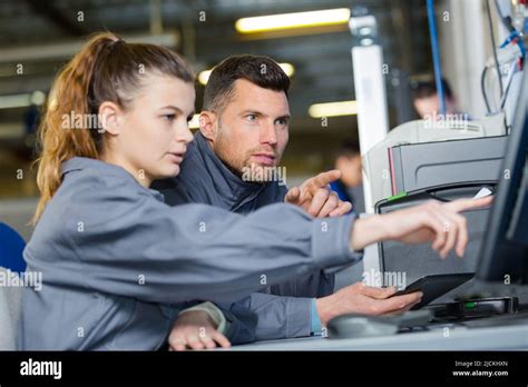 Workers Fixing An Office Printer Stock Photo Alamy