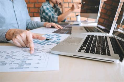 Team Of Professional Developer Programmer Cooperation Meeting And Brainstorming And Programming