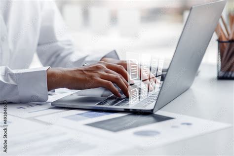 Businesswoman Working On A Laptop Computer To Document Management Online Documentation Database