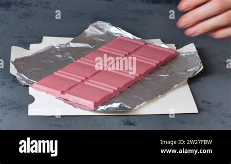 Breaking Ruby Chocolate Bar On Pieces New Dimension Of Chocolate Sweets Stock Video Footage Alamy