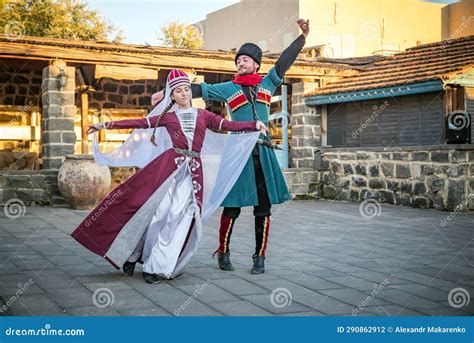 Circassian National Dance A Guy And A Girl In National Costumes