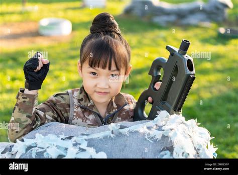 Happy Girl Playing Cs Stock Photo Alamy
