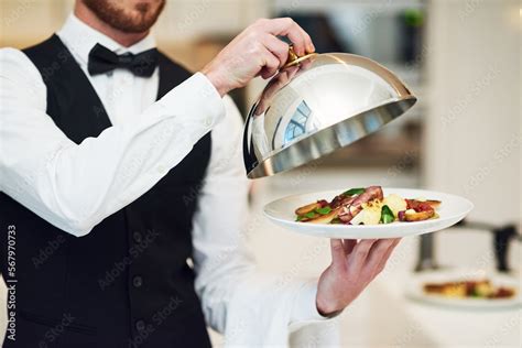 Waiter Hands And Opening Plate Of Food For Serving Meal Or Customer Service At Indoor