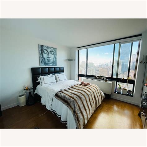 Black Leather Tufted Queen Bed Aptdeco