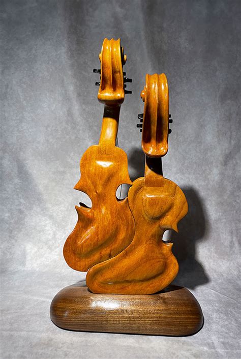 Playful Fiddles Surreal Carvings