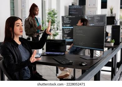 Web Developer Working Hologram Coding Language Stock Photo 2228052471