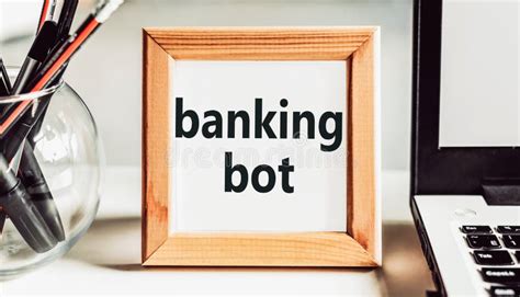 Banking Bot Text In A Wooden Frame On The Office Table The Term Refers To An Application That