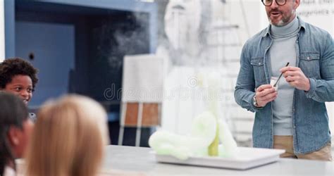 Chemistry Teacher And Experiment In Science Classroom With Excited