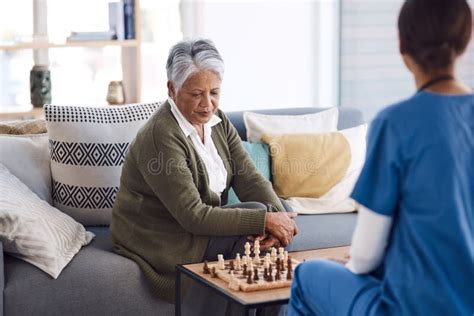 Nurse Chess Or Old Woman In Nursing Home For Healthcare Problem Solving Skills Or Mental