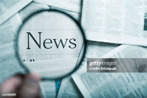 Magnifying Glass Looking At Paper Photos And Premium High Res Pictures