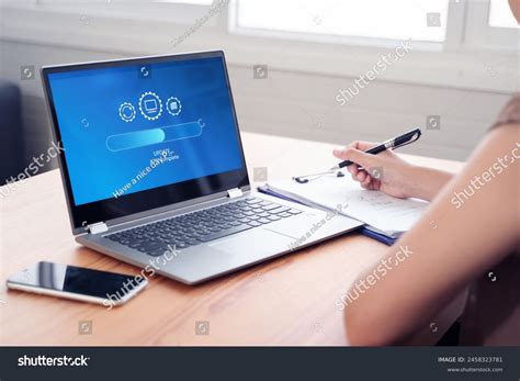 Businesswoman Updating Computer System Software Application Stock Photo 2458323781 Shutterstock