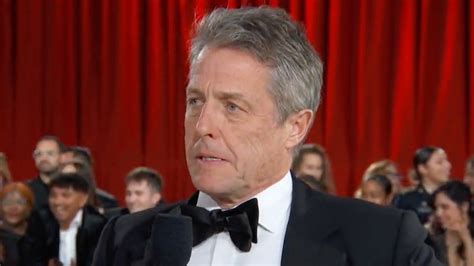 Hugh Grant S Awkward Oscars Include Ashley Graham Interview Scrotum Joke Twitter Reacts