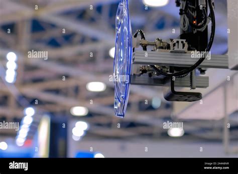 Automatic Robotic Arm Manipulator With Suction Cups Moves Container Lid