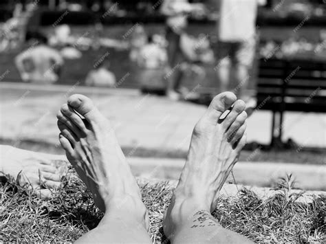 Premium Photo Low Section Of Man On Grass