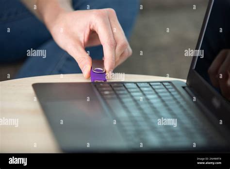 Woman Hand Plugging A Pendrive In A Laptop Stock Photo Alamy