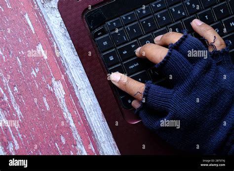 Hacker Hand Typing On Laptop Stealing Data Stock Photo Alamy