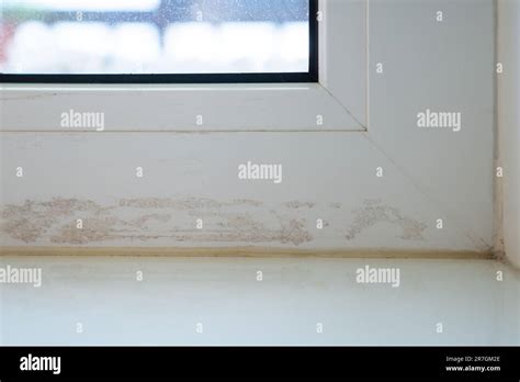 Dirty Window Frame After Sealing Cracks With Duct Tape Damaged Surface With Glue Residue Plaque