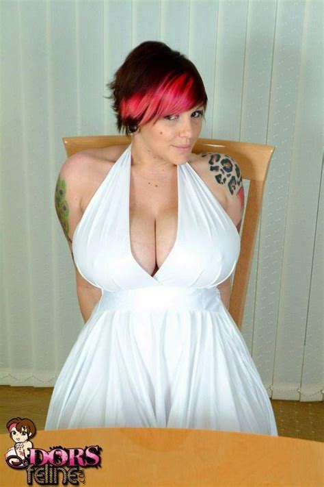 Pictures Of Dors Feline Showing You Her Enormous Tits Porn Pictures