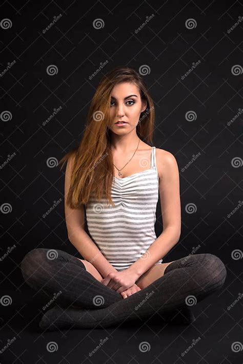 Portrait Of A Fit Woman Sitting On The Floor Stock Image Image Of Attractive Hair 50639537