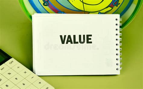 A Classroom Display Highlights The Word Value On A Notepad Alongside A