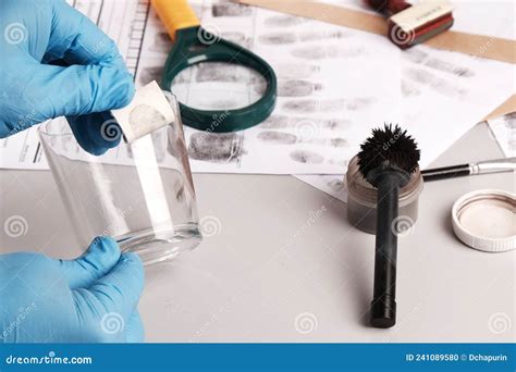 Forensic Fingerprint Analysis Criminalist Collects Latent Fingerprints