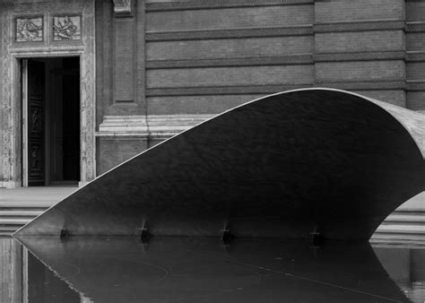 Zaha Hadid Installs Aluminium Wave Over Pool In Vanda Museum Garden