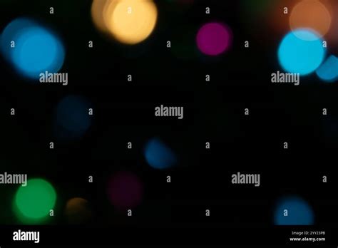 Colorful Frame With Christmas Lights With Bokeh Effect Abstract Wallpaper With Small And Large Colorful Frame With Christmas Lights With Bokeh Effect Abstract Wallpaper With Small And Large