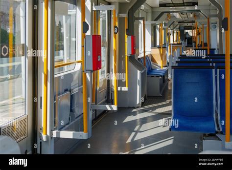 Interior View Of A Corridor Inside Passenger Trains With Blue Fabric