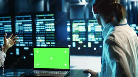 Engineering Coworkers Using Mockup Laptop To Implement Artificial