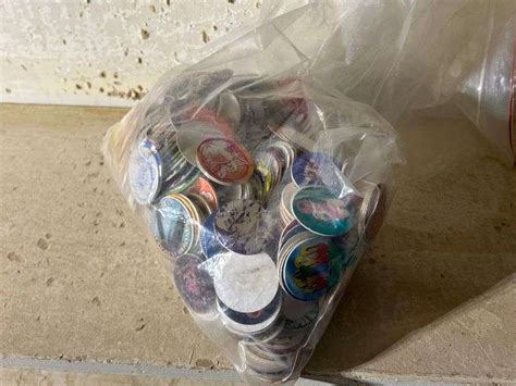 Large Bag Of Pogs Prime Time Auctions Inc
