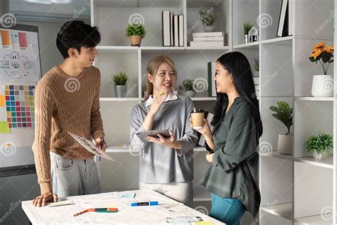 Creative Team Collaborating On Ux Ui Design Project In Modern Office Setting Stock Image Image