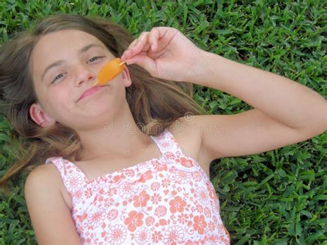 Girl Sucking Popsicle