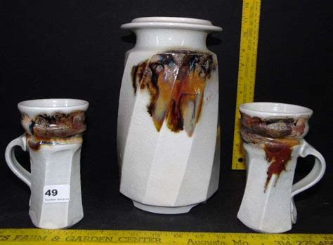 Phil Mayhew Pottery Pillar Candle Holder And Mugs Dunker Auction