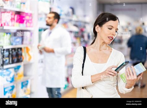 Woman Scanning Barcode Shopping Hi Res Stock Photography And Images Alamy