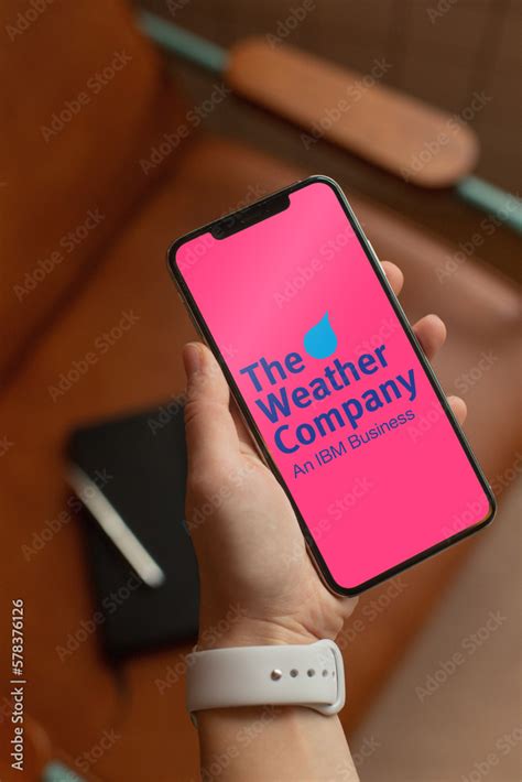 Mobile Phone With The The Weather Company By Ibm Logo On The Screen
