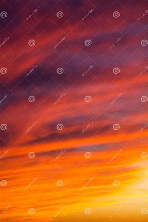 Breathtaking View Of A Sunset With Wispy Clouds In The Sky Stock Image