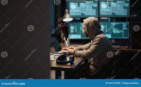 Young Adult Hacking Password To Break Server Interface Stock Image