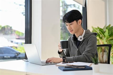 Premium Photo Smart Young Asian Male Programmer Or Web Developer