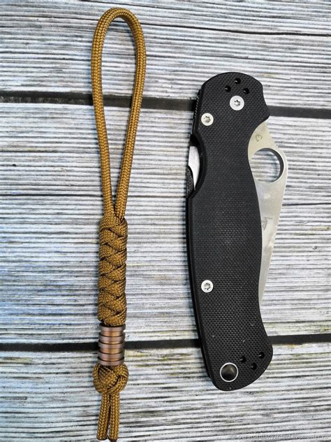 Темляк брелок из паракорда с бусиной Tc4 Бронзовый в интернет магазине на Ярмарке Мастеров