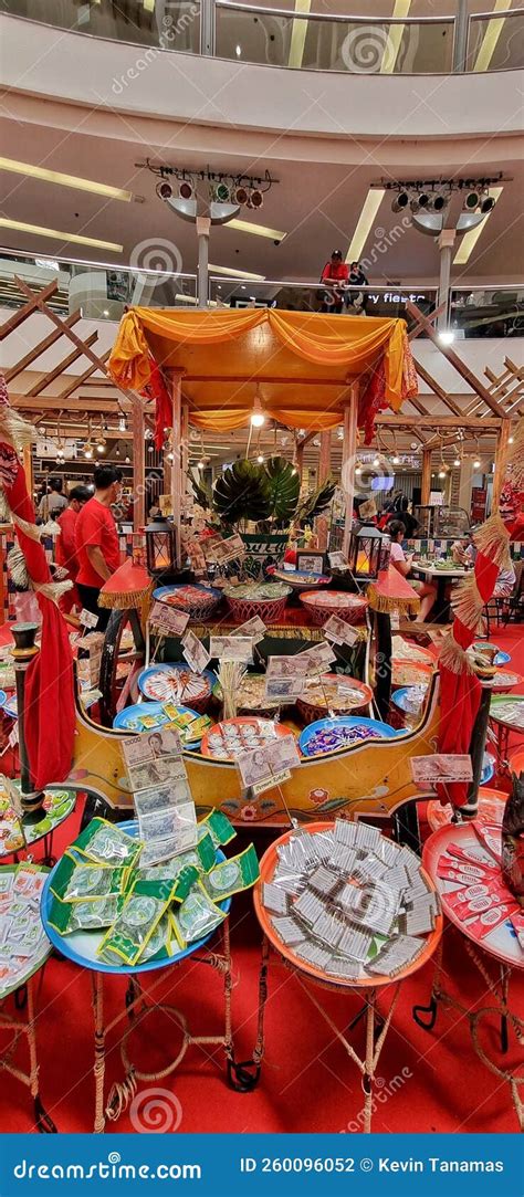 A Traditional Indonesian Food Booth Designed To Resemble An Old Cart At