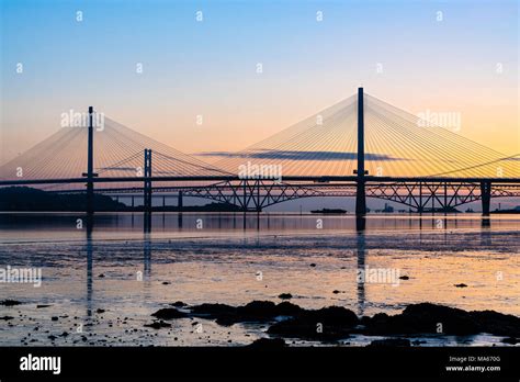 Sunrise View Of The Three Major Bridges Crossing The Firth Of Forth At South Queensferry